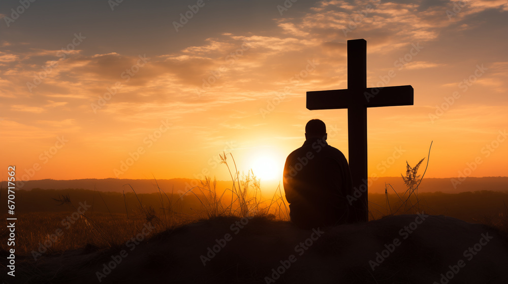 Silhouette of a person kneeling in front of a cross at dawn, Holy cross ...