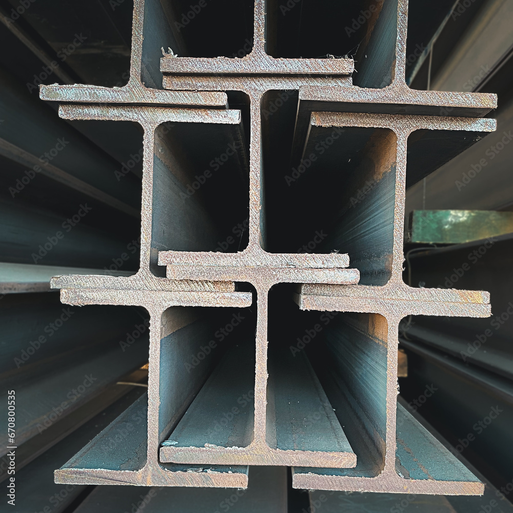 Steel beams production. Metal girders stack on project construction ...