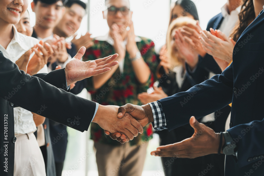 Cropped image of businessmen shaking hand and making a contract in the ...
