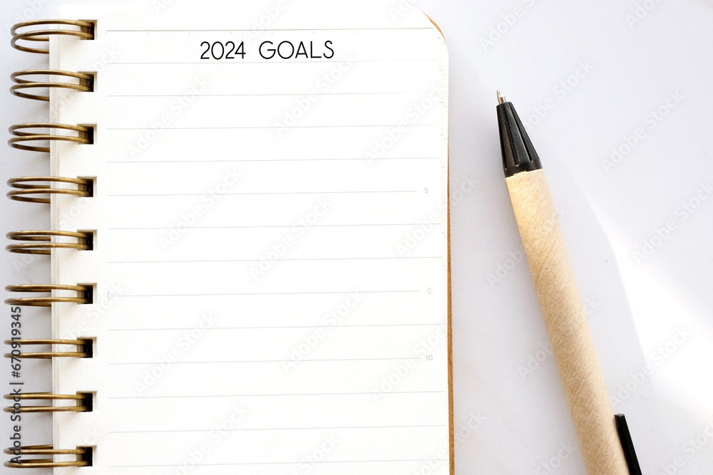 2024 goals on blank notebook paper on white background, 2024 new year ...