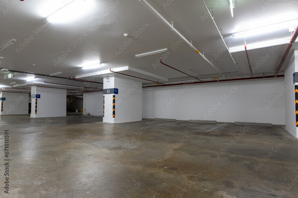 Empty car park with blank wall. space parking garage building and space ...
