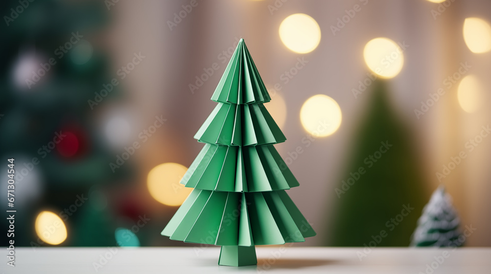 Paper Origami Christmas Tree on Table. Blurred Light on Background ...