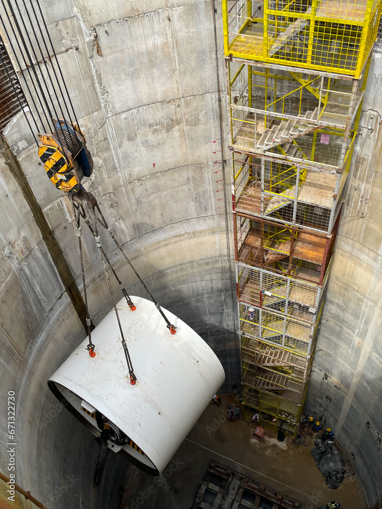Lift the drill head of tunnel boring machine into the construction ...