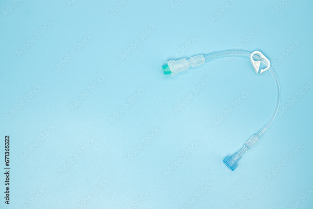 Extension tube with connector for intravenous catheter on blue ...