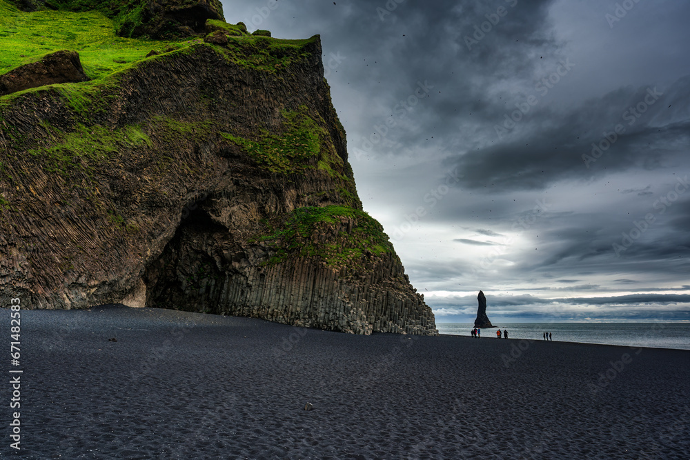 Halsanefshellir cave with Reynisdrangar natural rock formation on ...