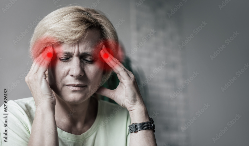 Close up photo of middle aged mature woman suffering from headache on ...
