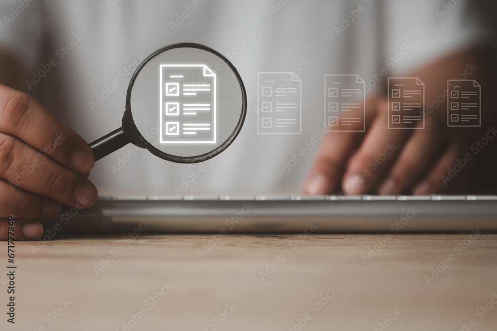 Businessman use a magnifying glass check document. Audit Document ...