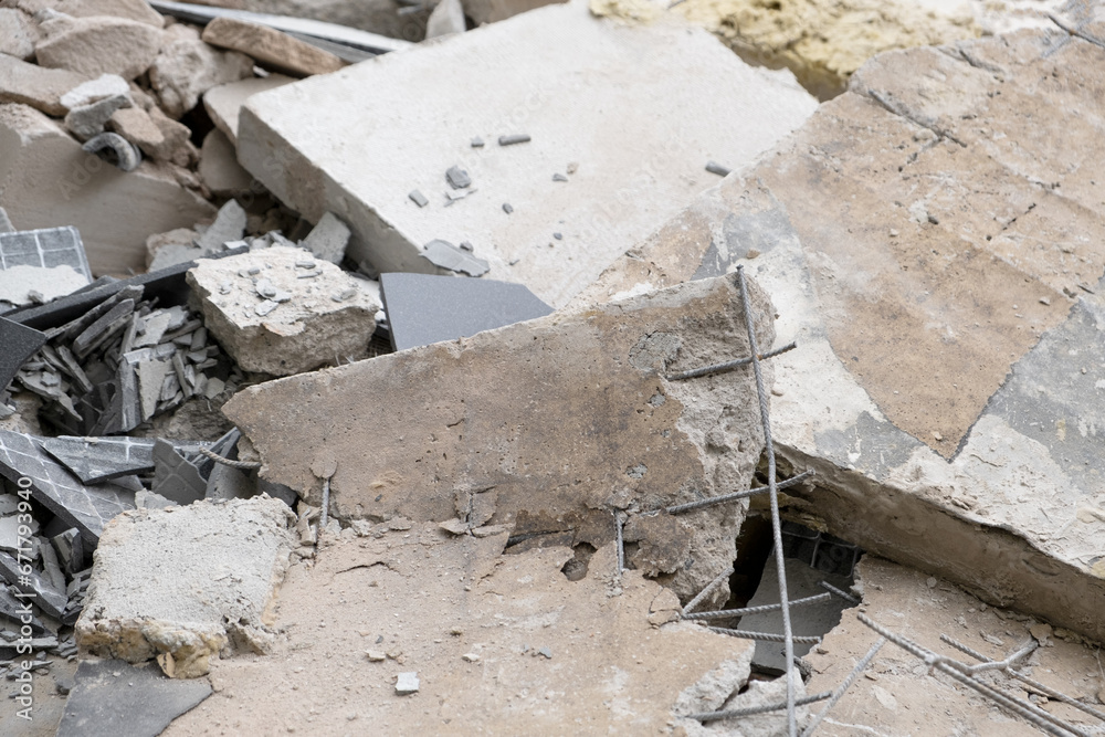 Shattered, broken wall bricks, construction waste after building ...