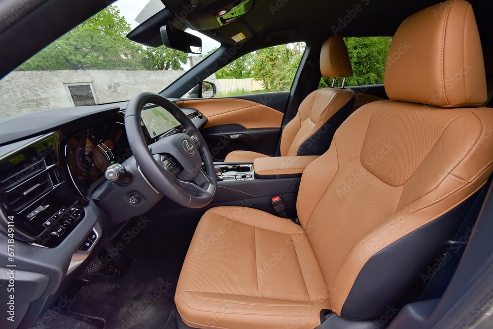 Lexus RX 450h+. A luxury car with a plug-in hybrid drive. Cabin ...