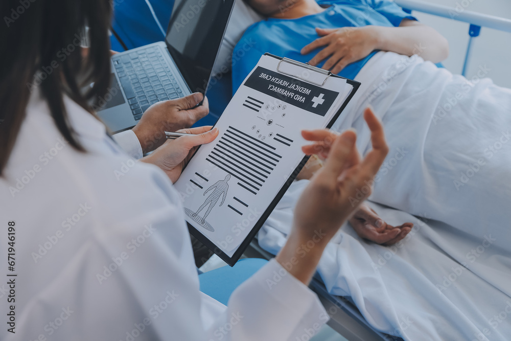 Injured patient showing doctor broken wrist and arm with bandage in ...