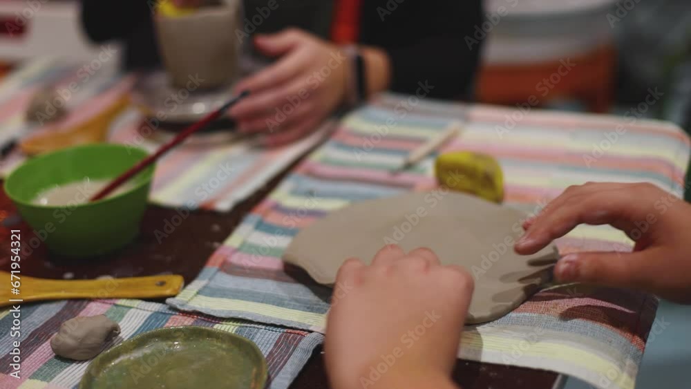 Vidéo Stock Pottery lesson master class for kids children, process of ...