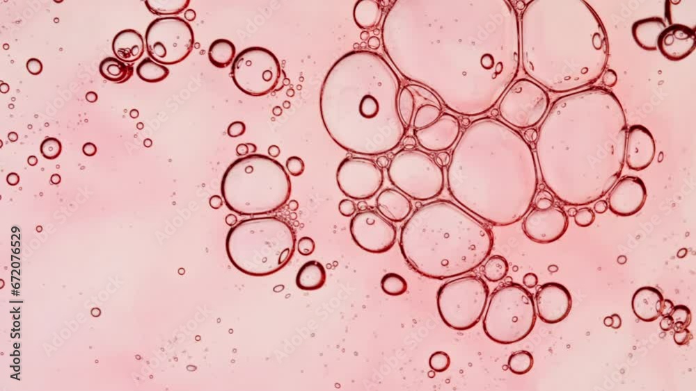 Bubble cluster, cells under a microscope. Transparent cosmetic gel ...