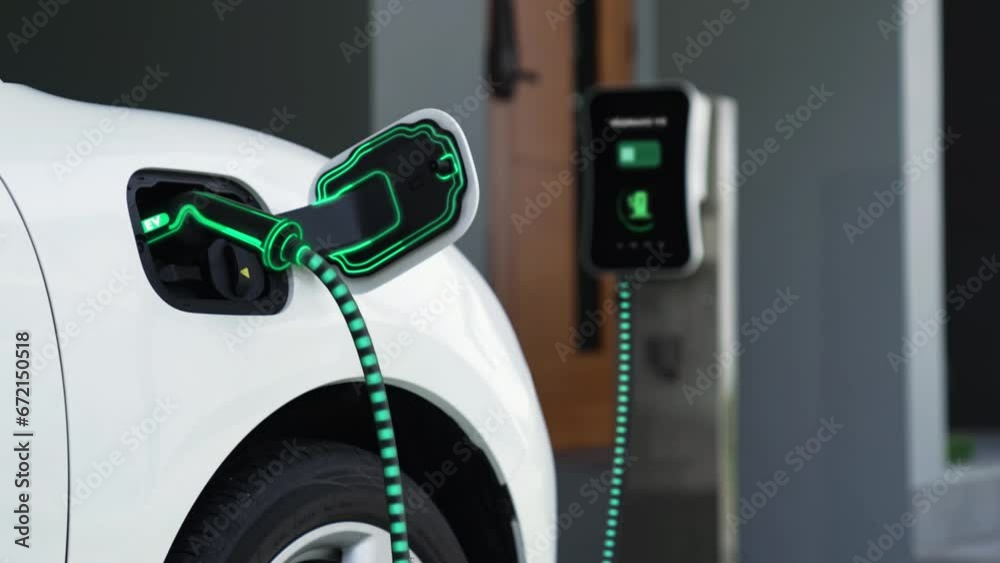 Electric car recharging from home charging station by futuristic EV ...