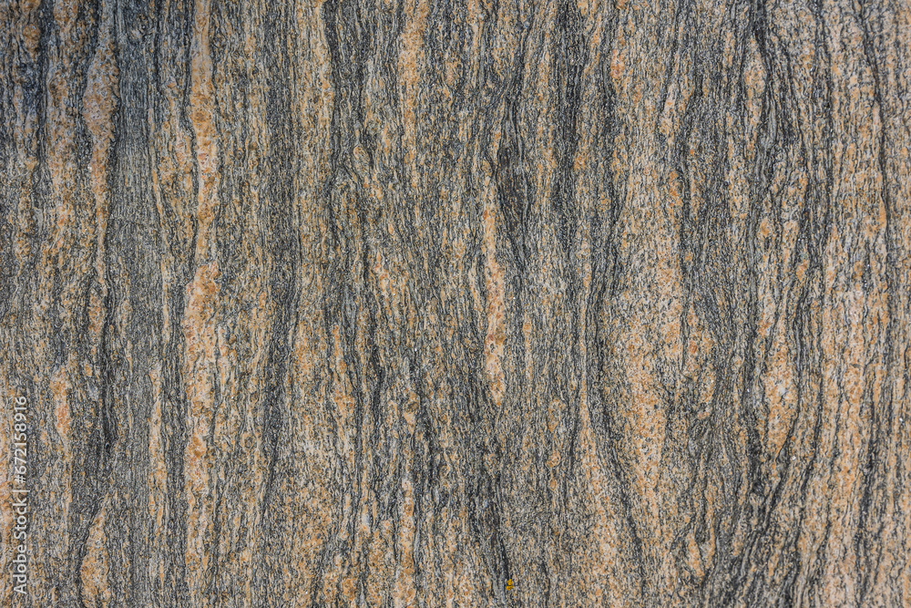 Pattern background of granite stone. Vertical lines from a brown stone ...