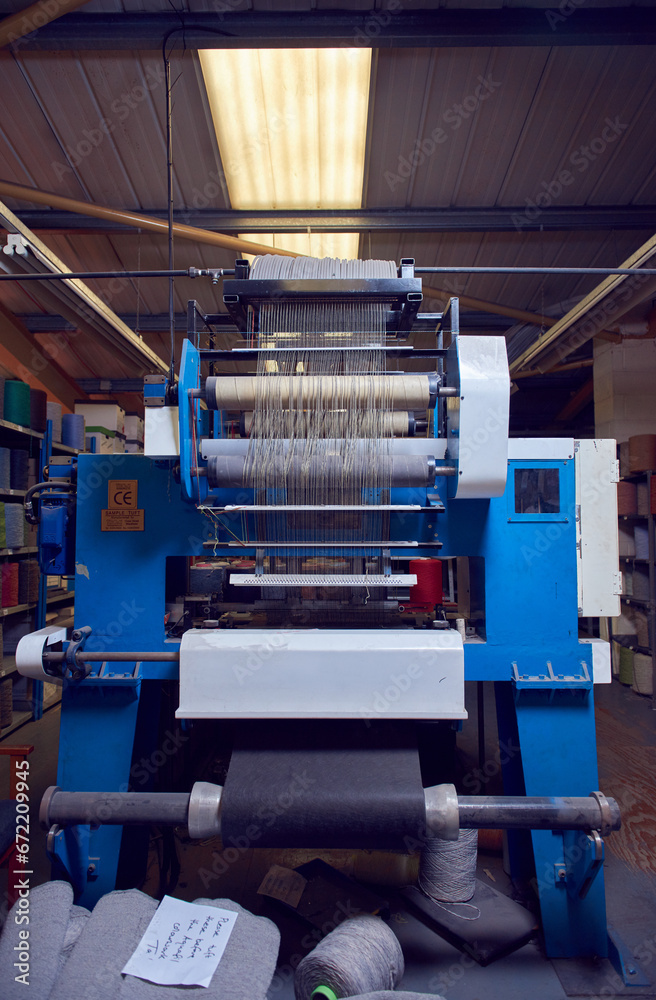 Kent, uk 01.01.2023 Cotton threads in industrial cotton in a weaving ...
