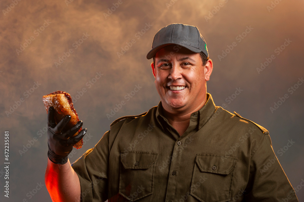 Barbecue master. Middle aged hispanic man for barbecue. Roasting ...