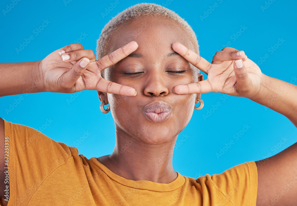 Kiss, black woman and peace hands on face in studio for self love ...