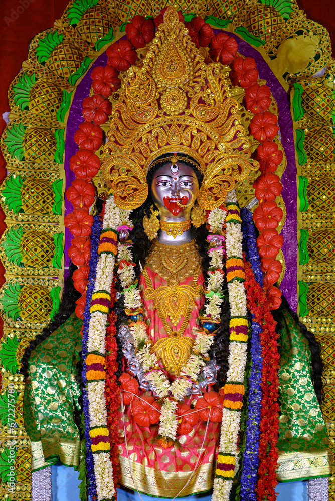 Idol of Goddess Maa Kali at a decorated puja pandal in West Bengal ...