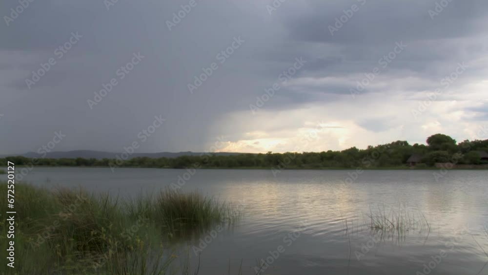 Gaborone dam in Botswana, lake at sunset, hills in the background Stock ...