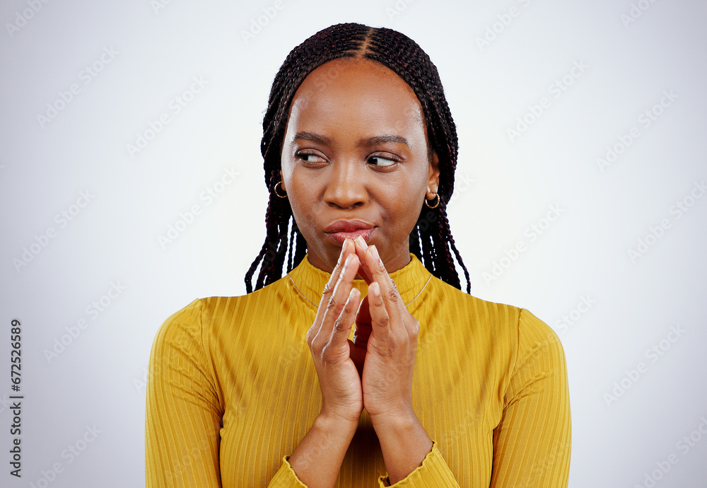 Thinking, black woman and scheme hands in studio for evil, planning or ...