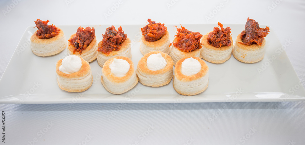 Puff pastry canapes with Iberian chorizo and Torta del Casar cheese ...