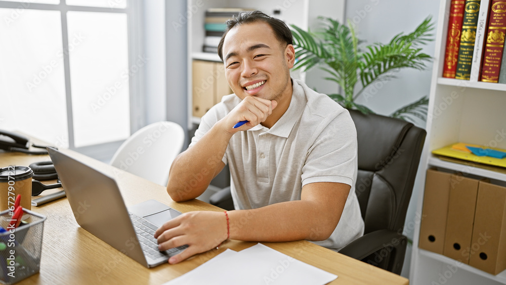 Confident, young chinese worker smiling at success, working ...