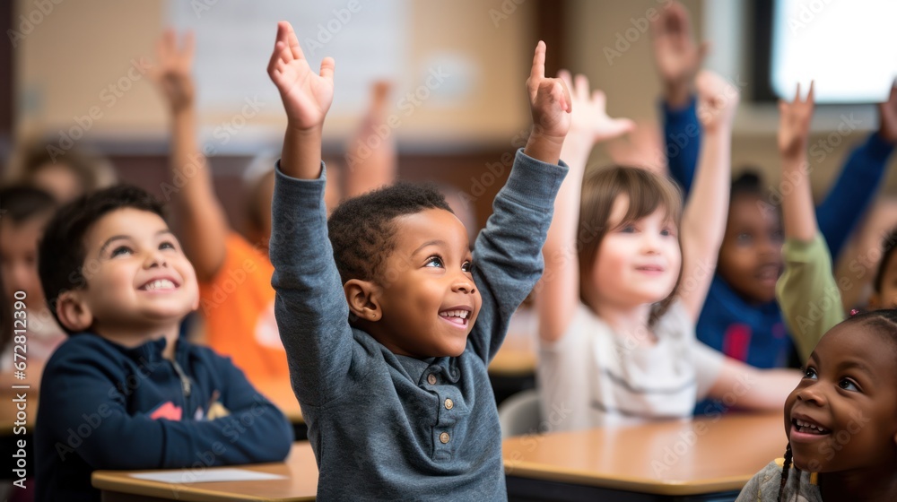 Students raise their hands to answer in the classroom. education and ...