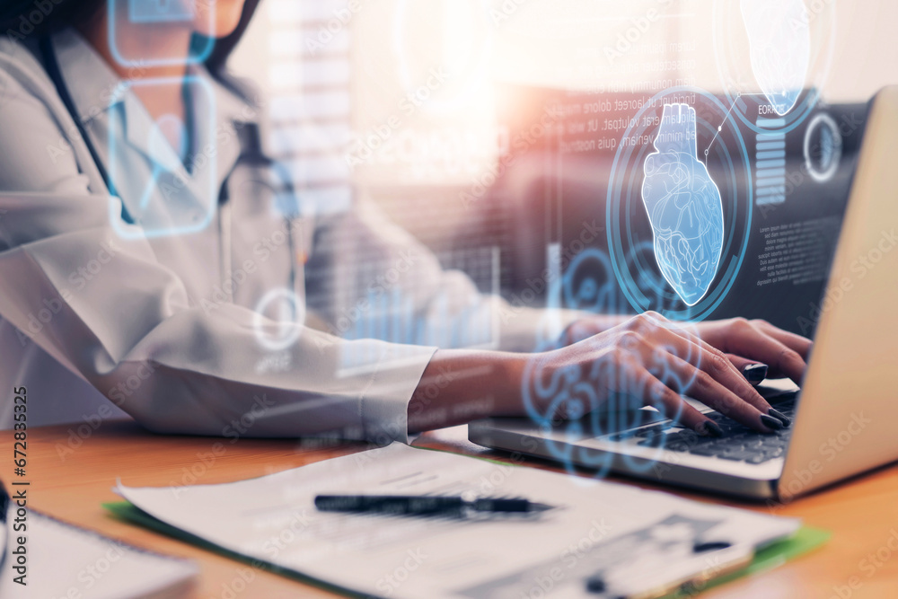 Doctor working office research studying heart disease illness, using ...