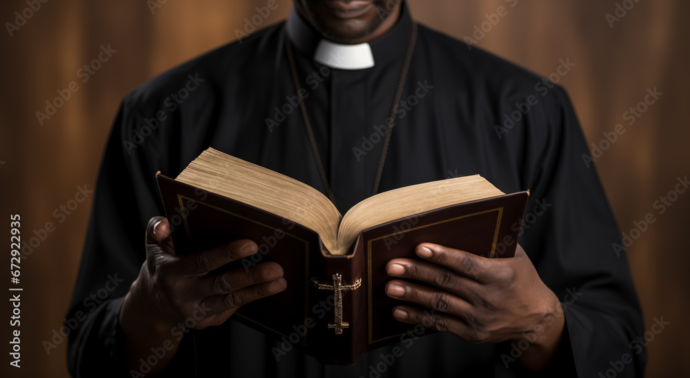 Pastor with a Bible in his hand during a sermon. The preacher delivers ...