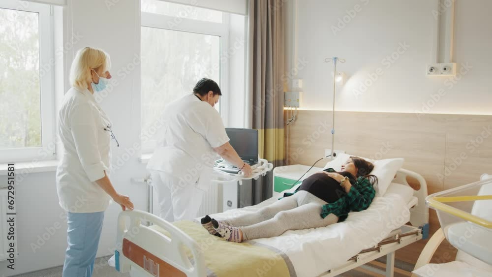 In the Hospital, Close-up hot of the Doctor does Ultrasound, Sonogram ...