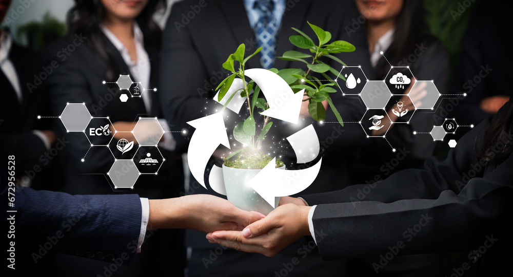 Business partnership nurturing or growing plant together with recycle ...