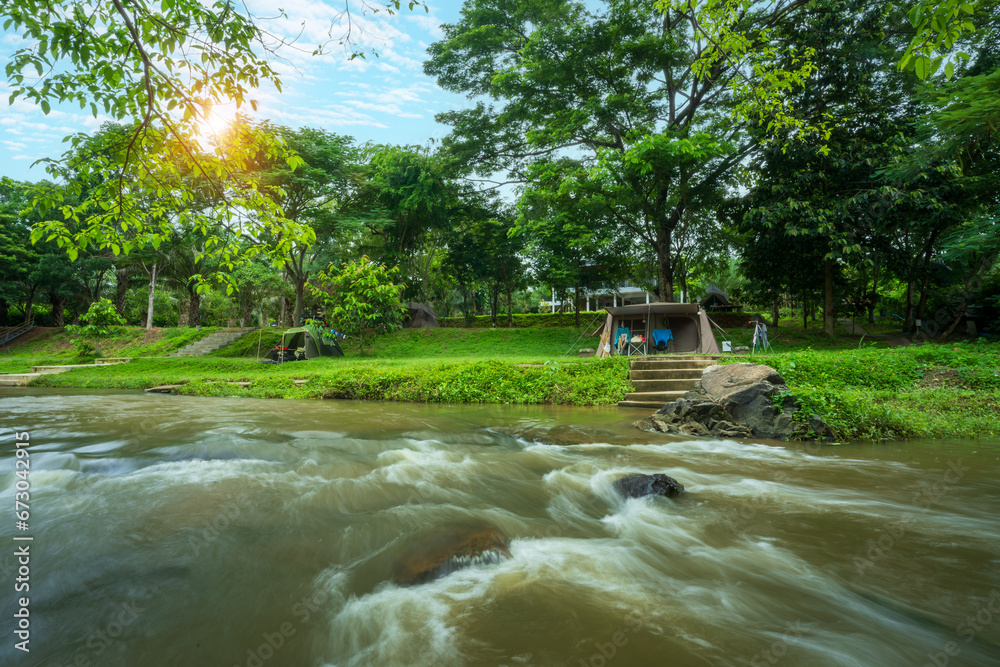 nature camping tent and family relax camp in green trees and garden ...