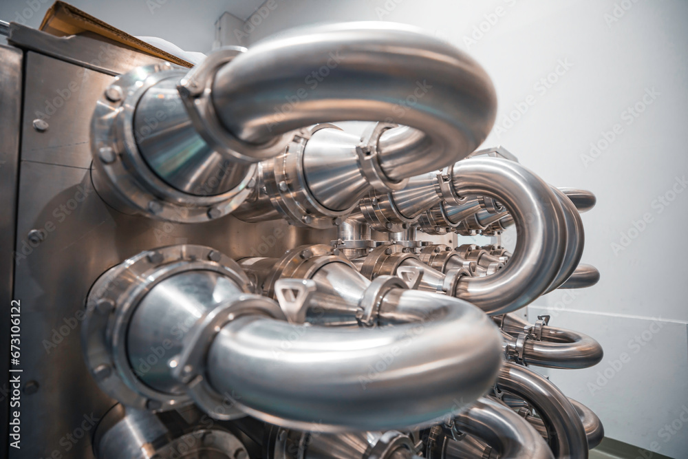 Industrial pipeline elbow system. Large, thick exchanger stainless ...