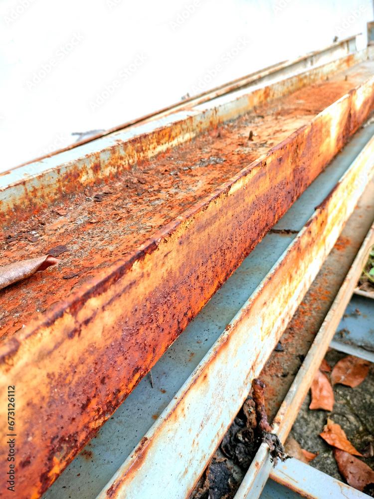 rusty steel beams that are no longer used from demolished buildings ...