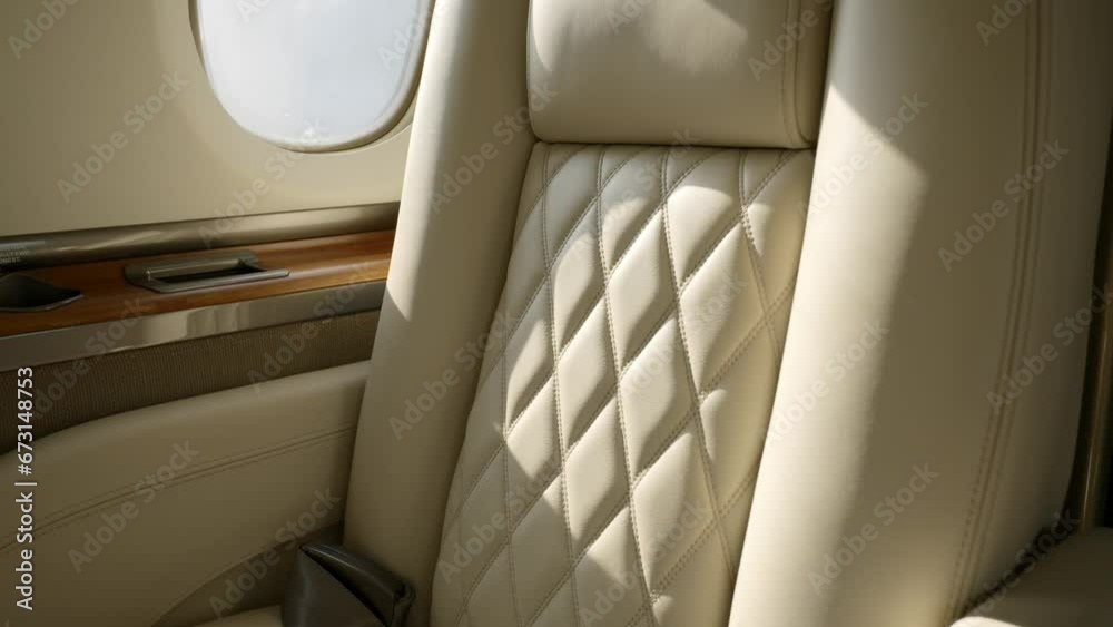Rotating shot of leather passenger seat lighted by sun beams. Luxury ...