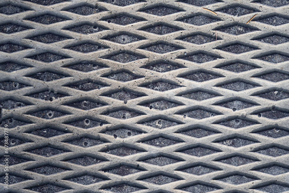 Graphic background of diamond shaped pattern in light and dark metal ...