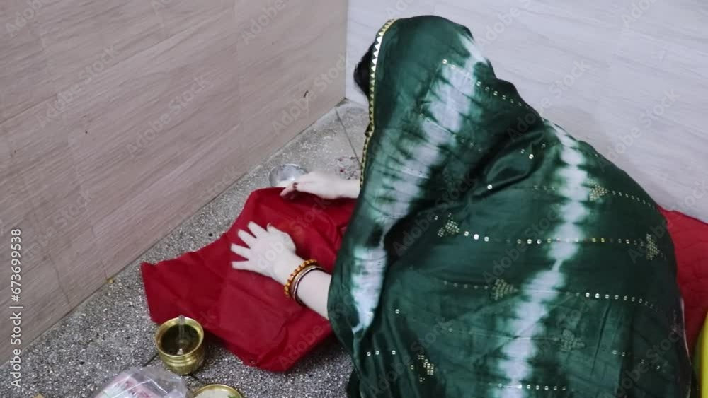 indian women doing holy rituals at home for children's wellbeing from ...
