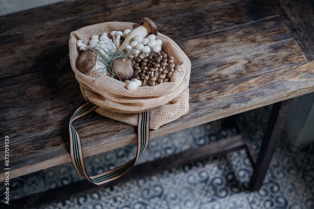 Various edible Asian mushrooms. Enoki, shimeji, shiitake, tea tree ...