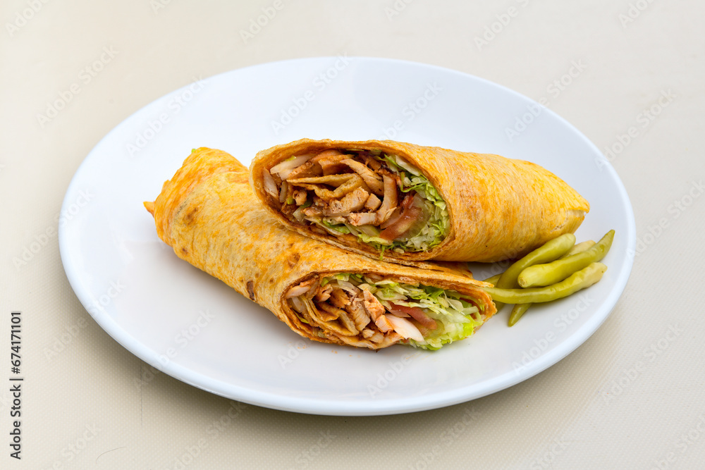 Lavash doner kebab ( zurna doner durum ) or shawarma sliced in plate ...