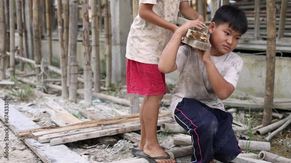 Poor children at the construction site were forced to work. Concept ...