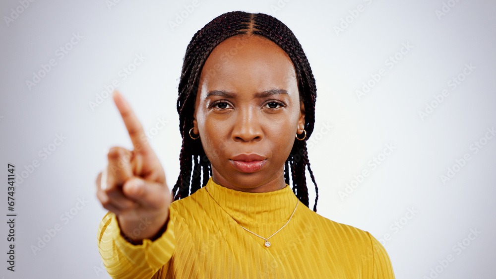No finger, black woman and angry portrait with protest, caution and ...