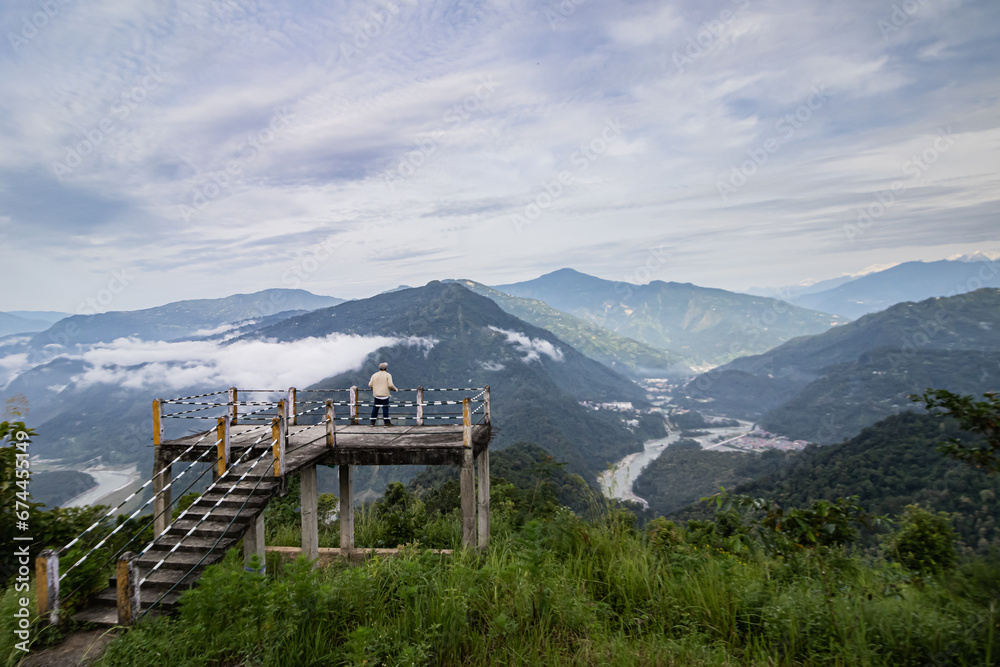 Hills and mountains of kalimpong with flowing teesta river. A person ...
