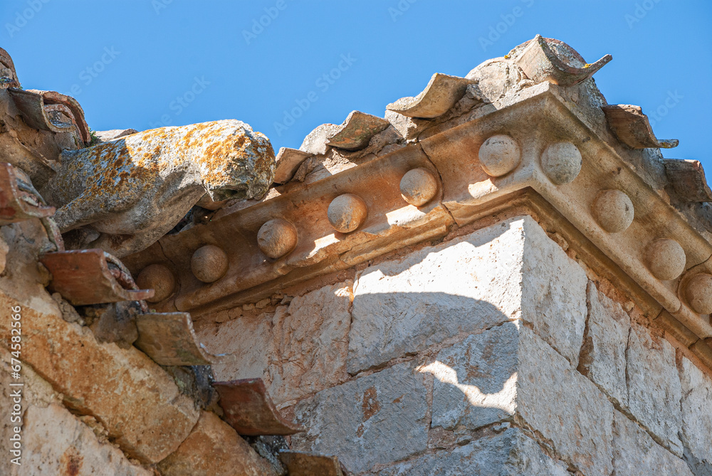 Poster Romanesque ledge with gargoyles on the roof for water drainage ...
