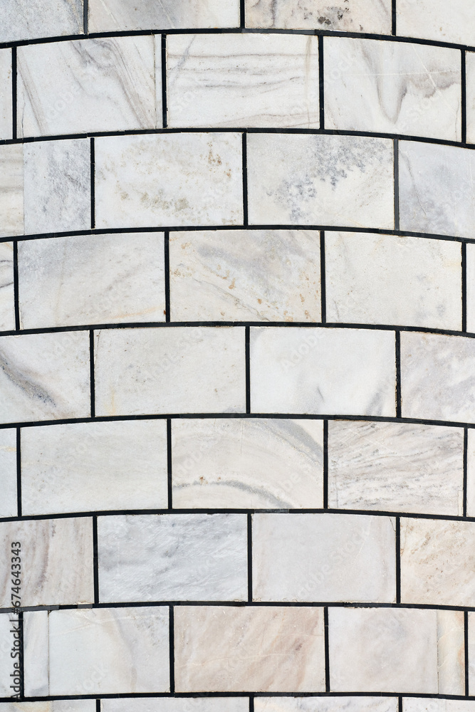 White marble bricks of Taj Mahal minaret towers, close up ivory white ...