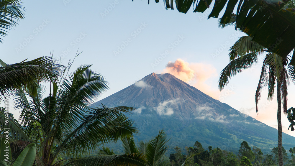 Eruption of Volcano Semeru on the island of Java. The volcano emits ash ...