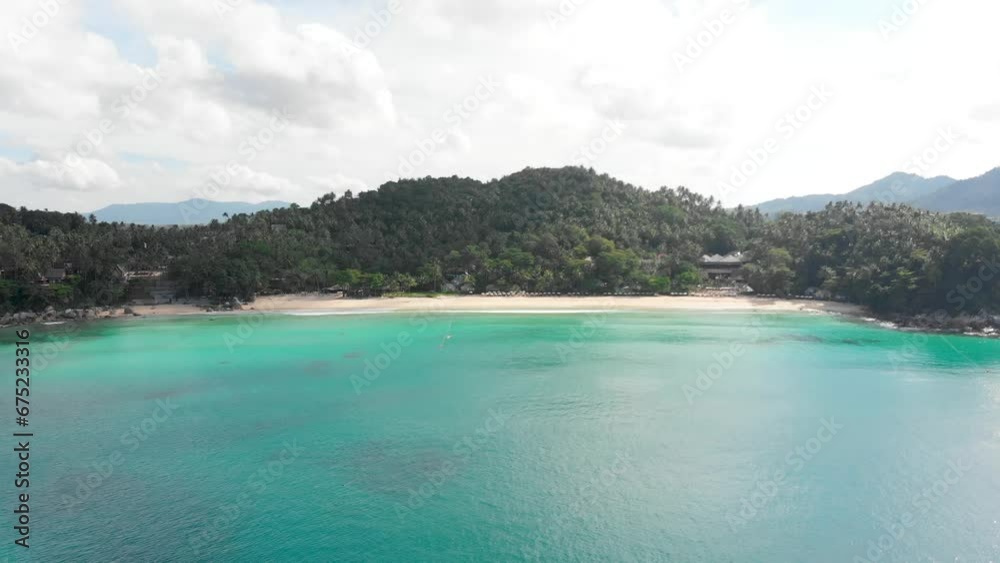 An aerial slow reveal of Pansea Beach resort, located on the West Coast ...