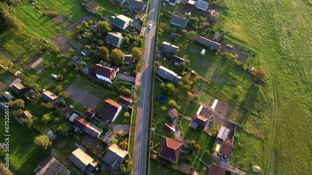 Vidéo Stock Road trought village with Wooden homes. Country houses in ...