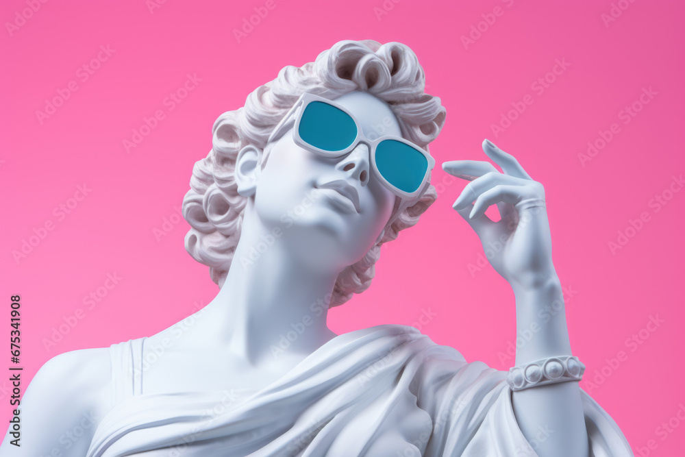 Portrait of a white sculpture of Aphrodite wearing blue glasses sitting ...