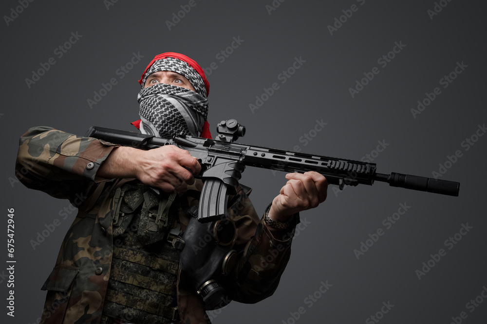 Middle Eastern radical fanatic soldier donning a white keffiyeh and ...