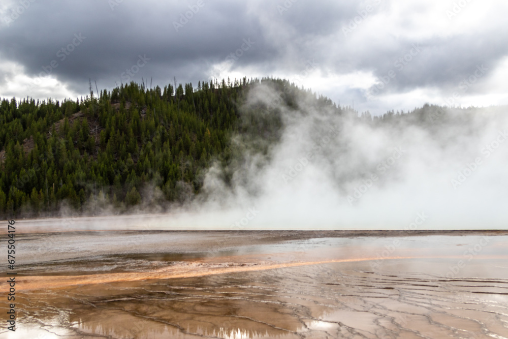 The Grand Prismatic Spring on a cold cloudy winter day in Yellowstone ...